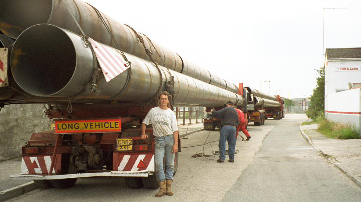 Shane Carr with a delivery of 25 metre long steel tubes for the ...